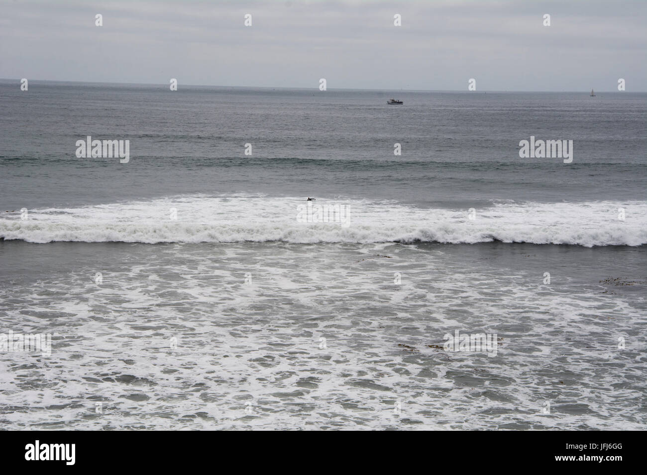 A cloudy and very overcast day on a beach Stock Photo - Alamy