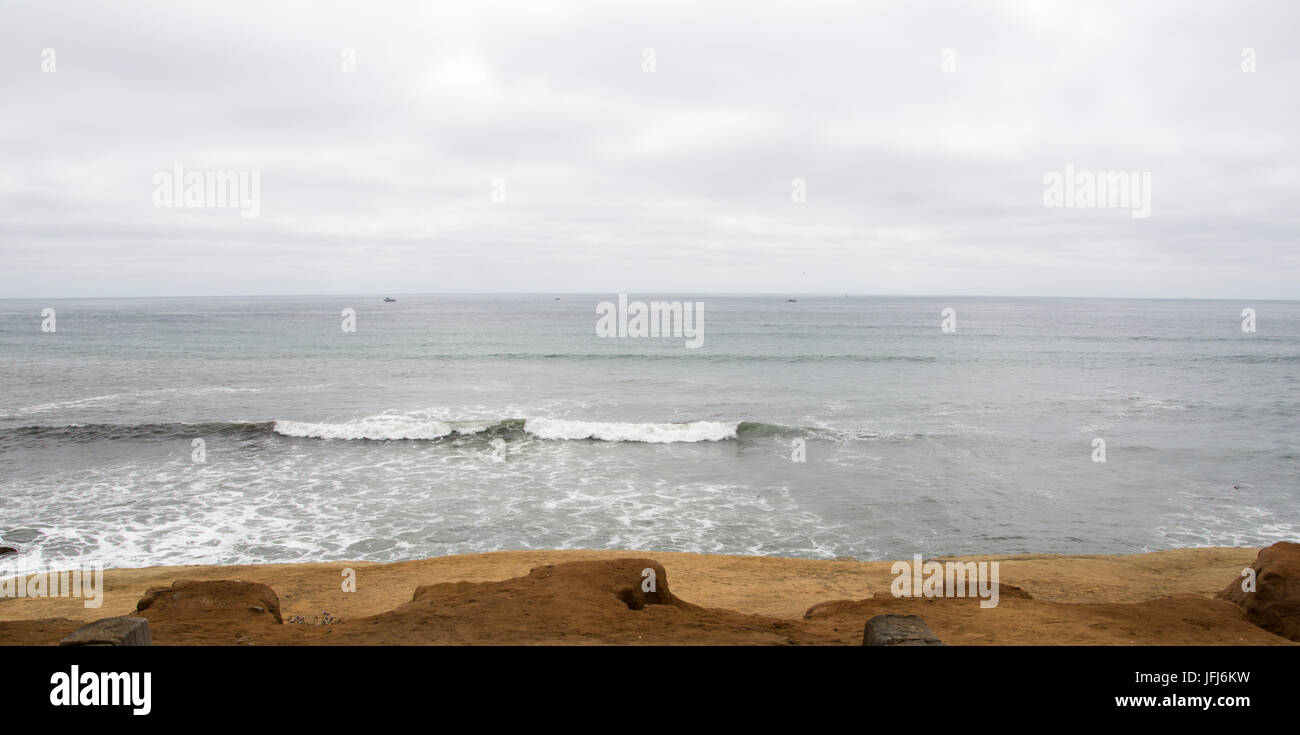 A cloudy and very overcast day on a beach Stock Photo - Alamy