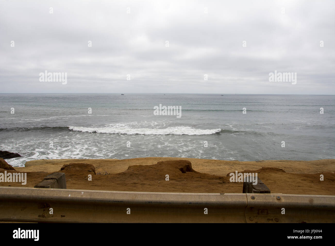 A cloudy and very overcast day on a beach Stock Photo - Alamy