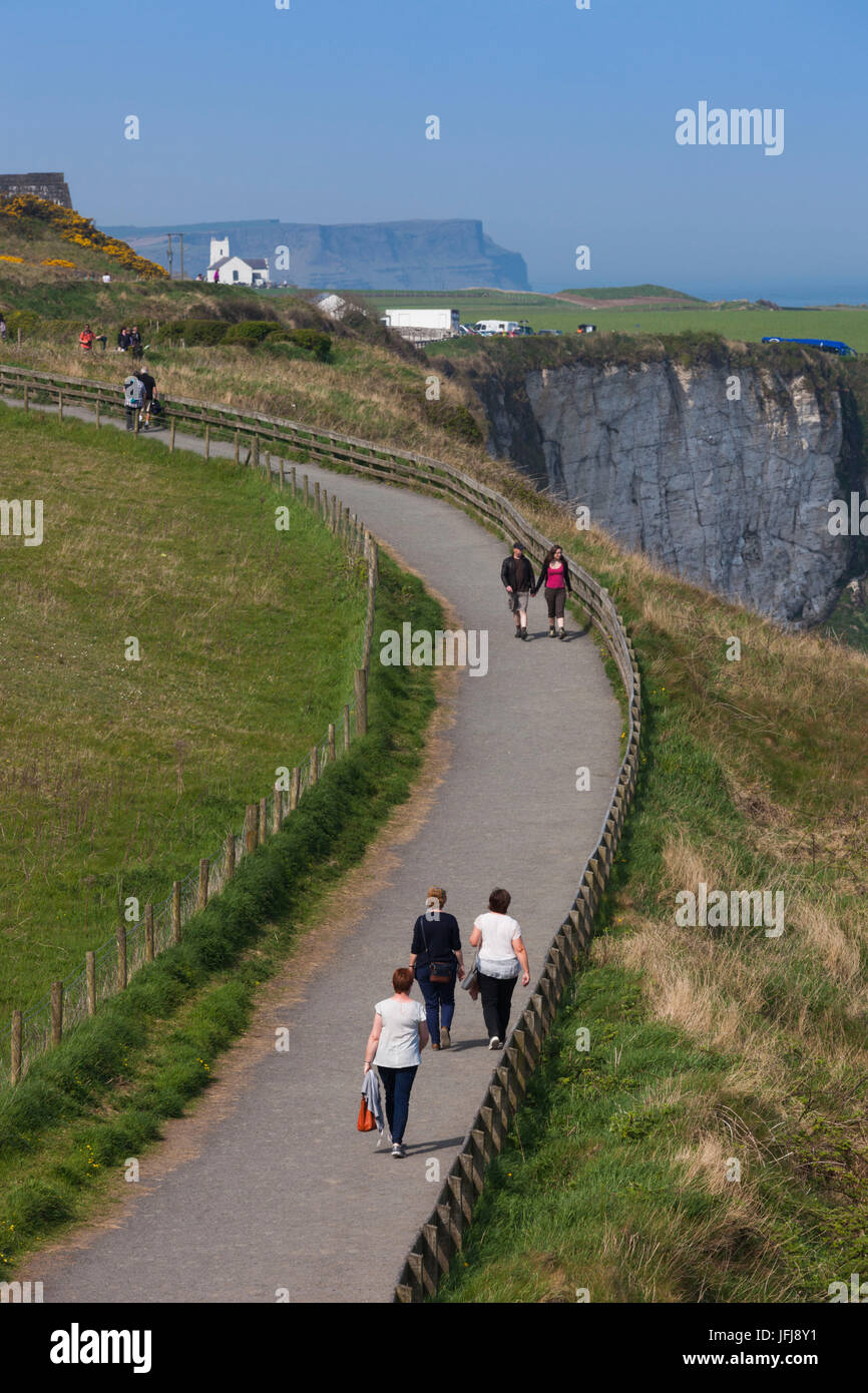 UK, Northern Ireland, County Antrim, Ballintoy, pathway to the Carrick ...