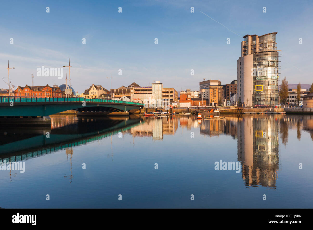 UK, Northern Ireland, Belfast, city skyline along River Lagan, dawn ...