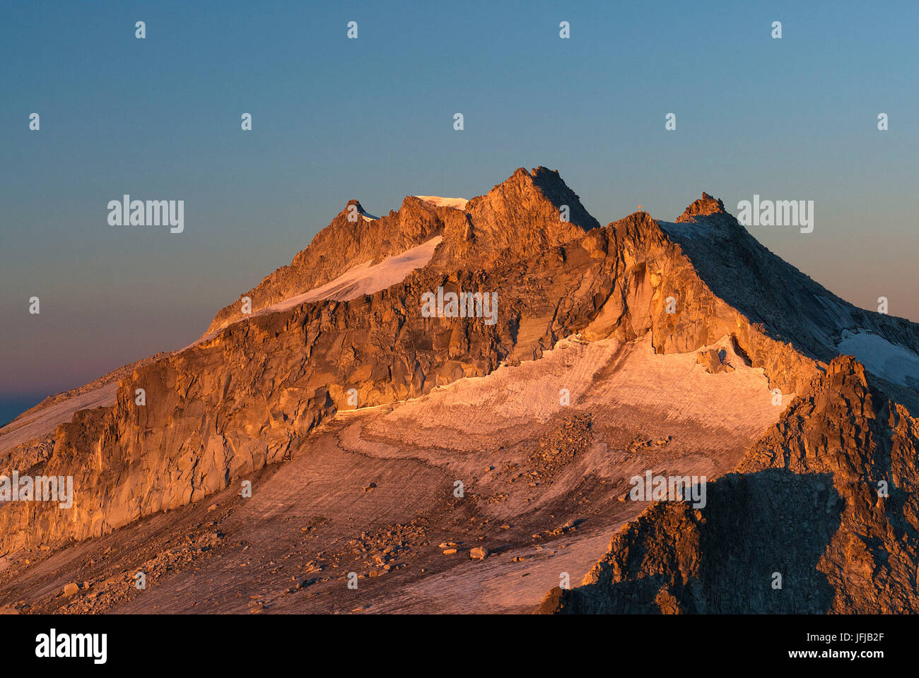 Adamello, Trentino, Italy, Alpenglow in the walls of the Cresta Croce ...