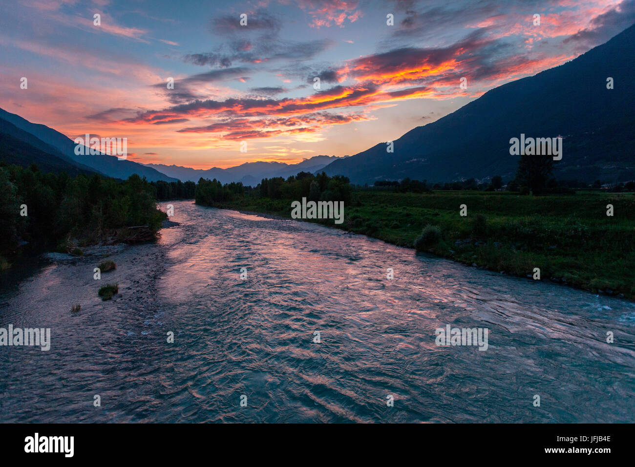 Sunset from Adda river, Valtellina, Lombardy, Italy Stock Photo - Alamy