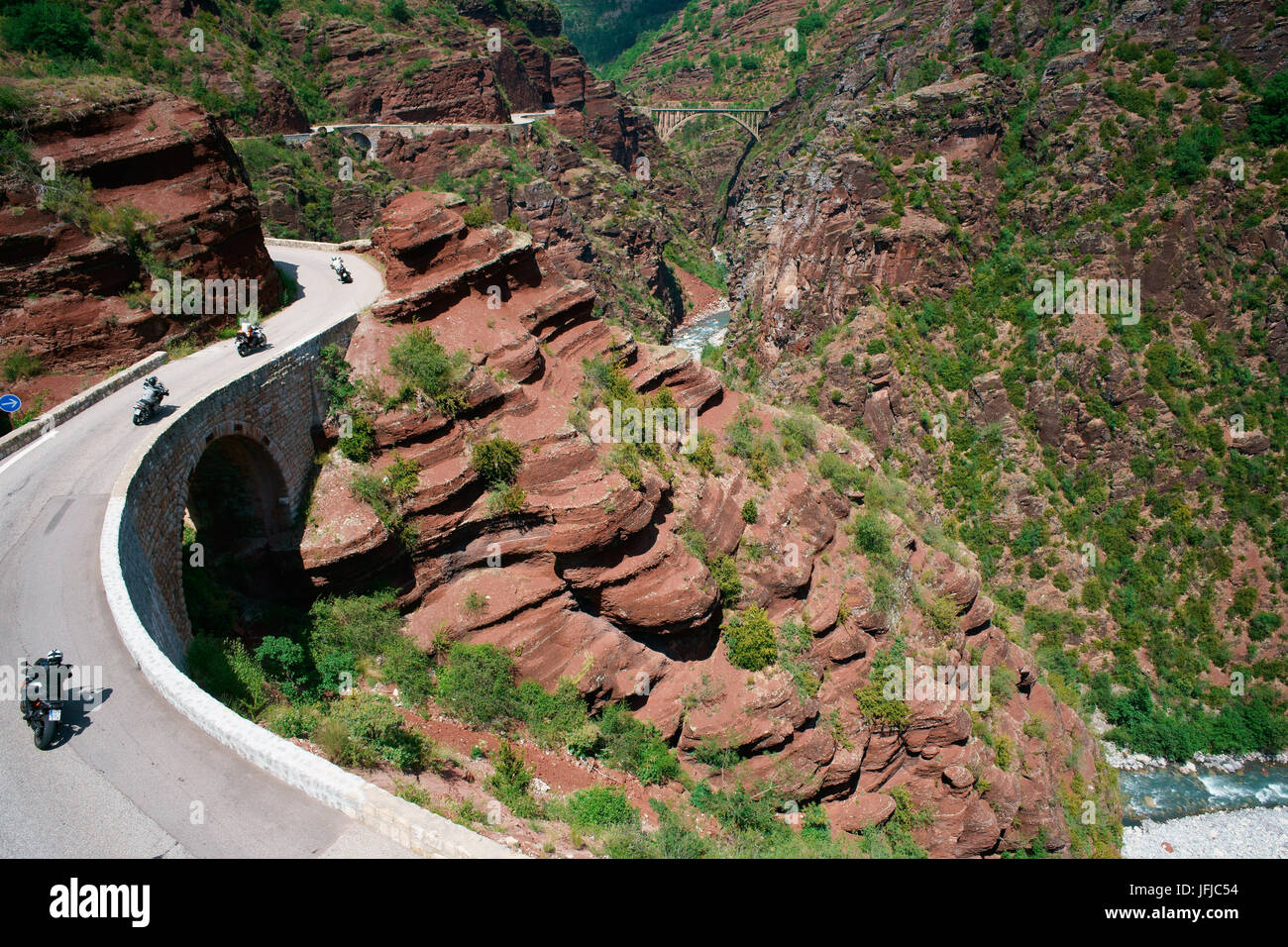 Four motorcyclists exploring the spectacular Daluis Gorge. Guillaumes ...