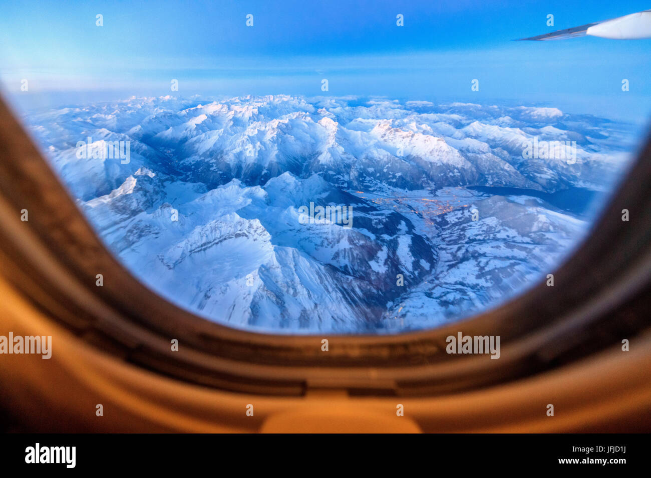Aerial view of the snowy alps in flight towards Oslo Norway Europe ...
