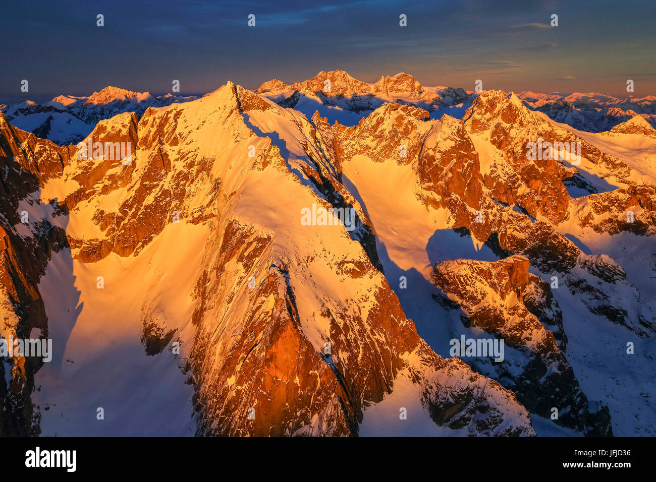 Aerial view of peaks Torrone at sunset Masino Valley Valtellina ...