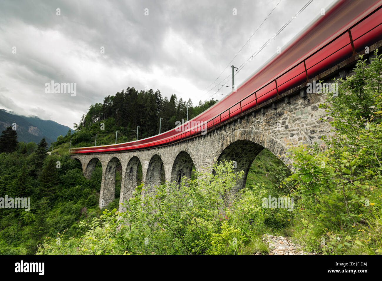 Red Bernina Express train, Filisur, Graubunden, Switzerland Stock Photo ...