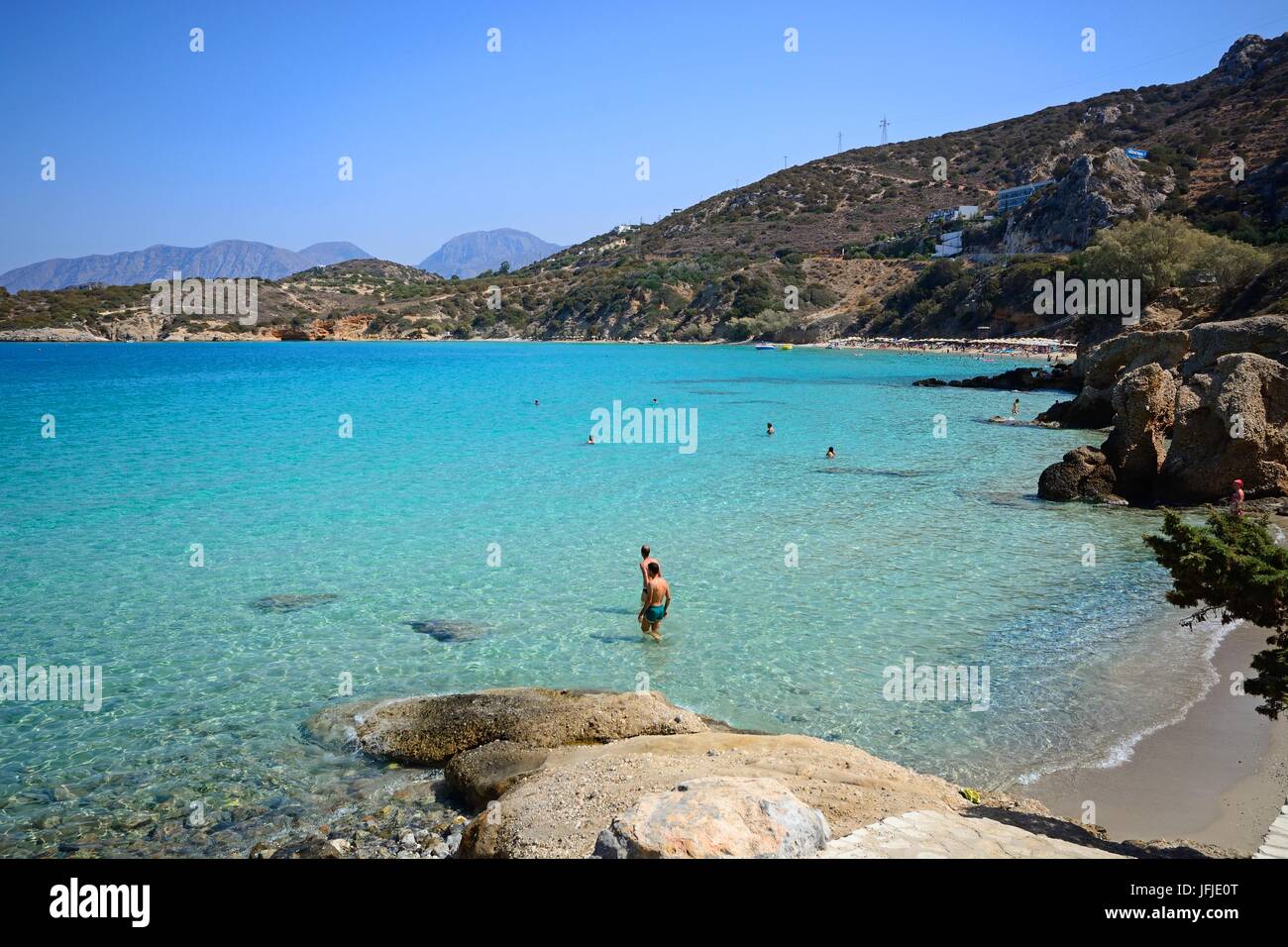 Tourists relaxing on the beach, Istro, Crete, Greece, Europe Stock ...