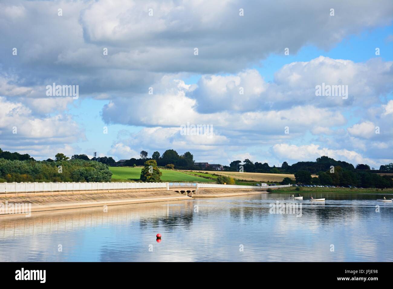 View across Blithfield reservoir with a road bridge to the left hand ...