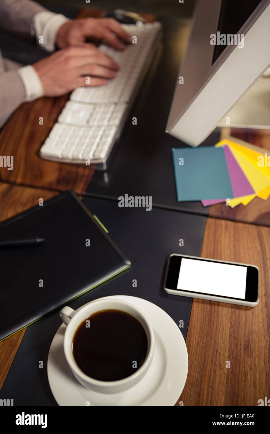 Creative businessman using computer Stock Photo - Alamy