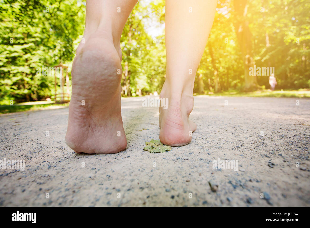 Female barefoot legs walking in nature Stock Photo - Alamy
