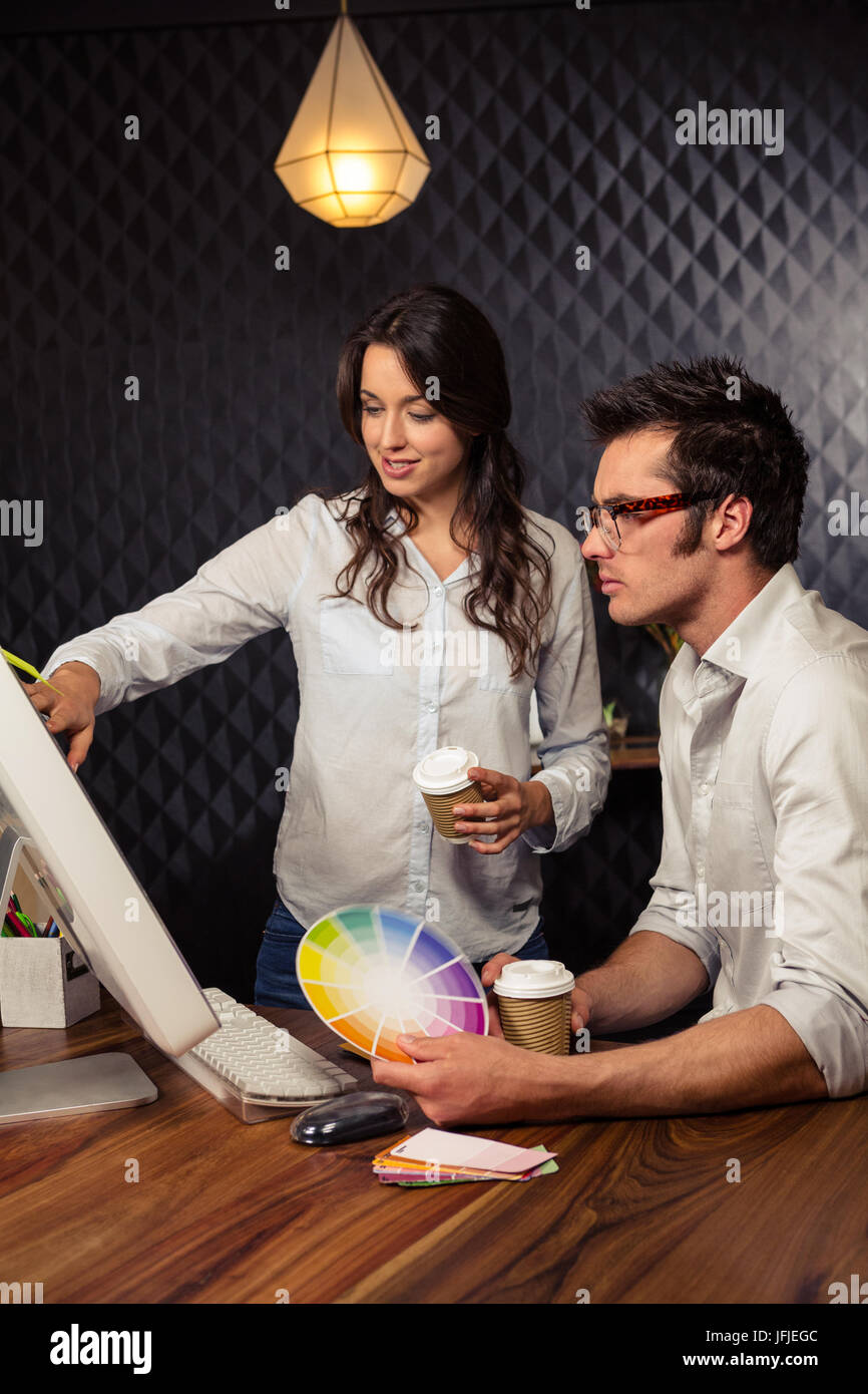 Creative business people working with colour samples Stock Photo - Alamy
