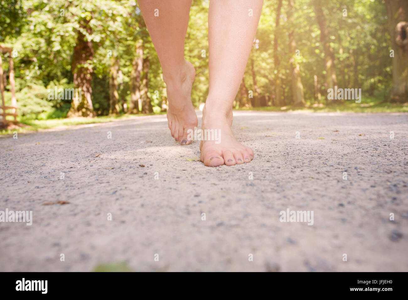 Female barefoot legs walking in nature Stock Photo - Alamy