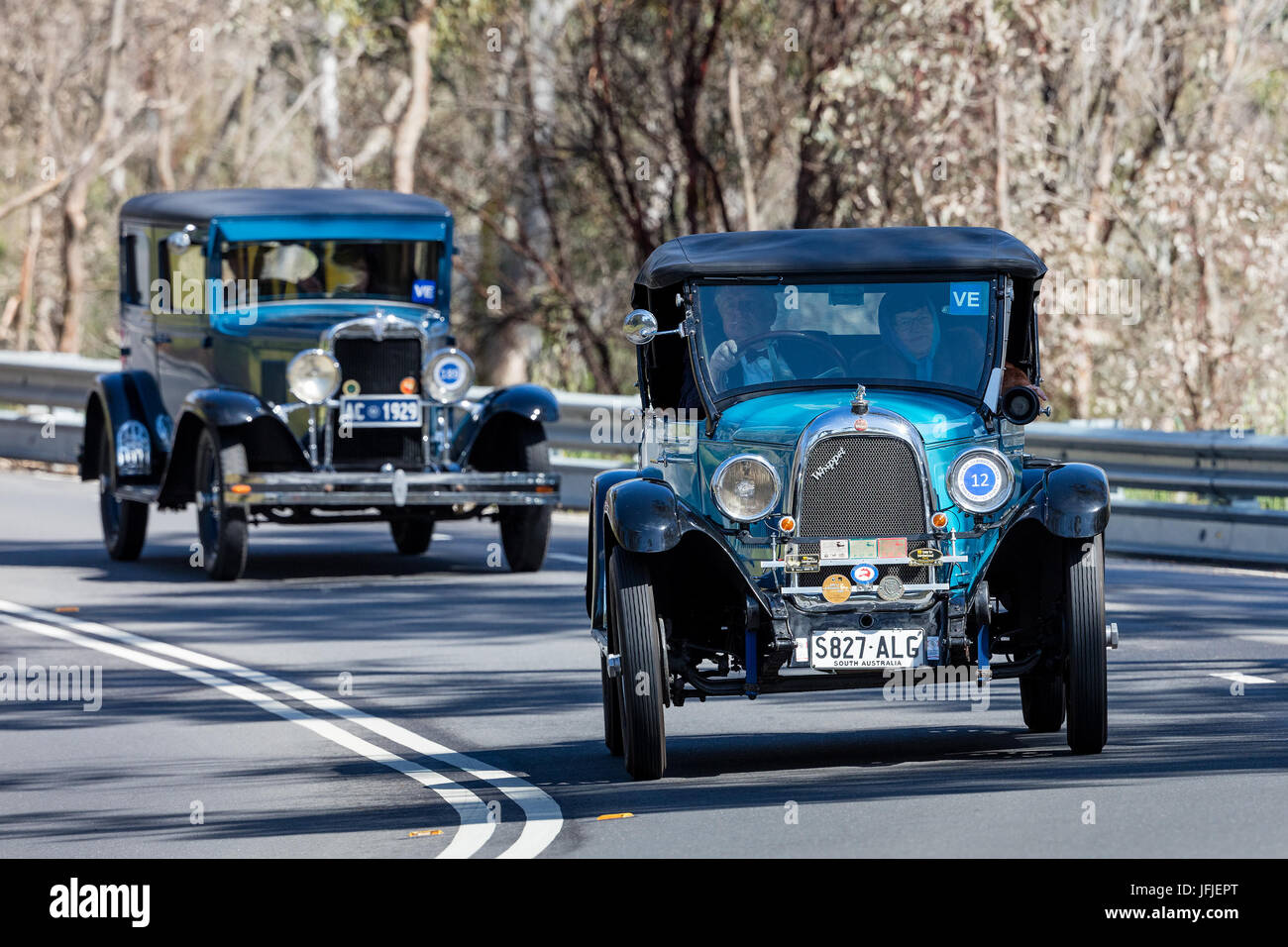 Vintage 1928 Whippet 96 Roadster driving on country roads near the town ...