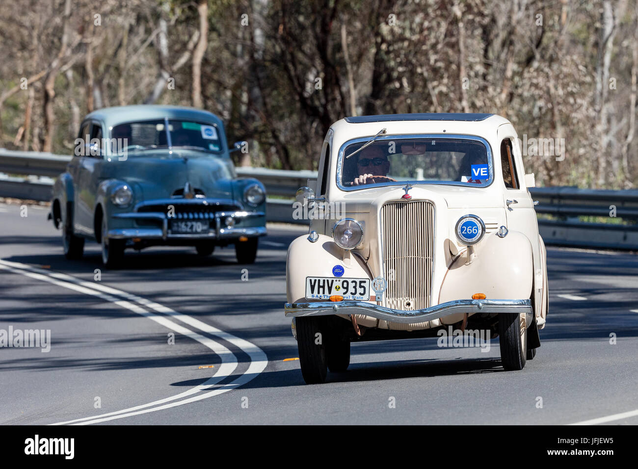 Vintage 1935 Ford C Model Tourer driving on country roads near the town ...