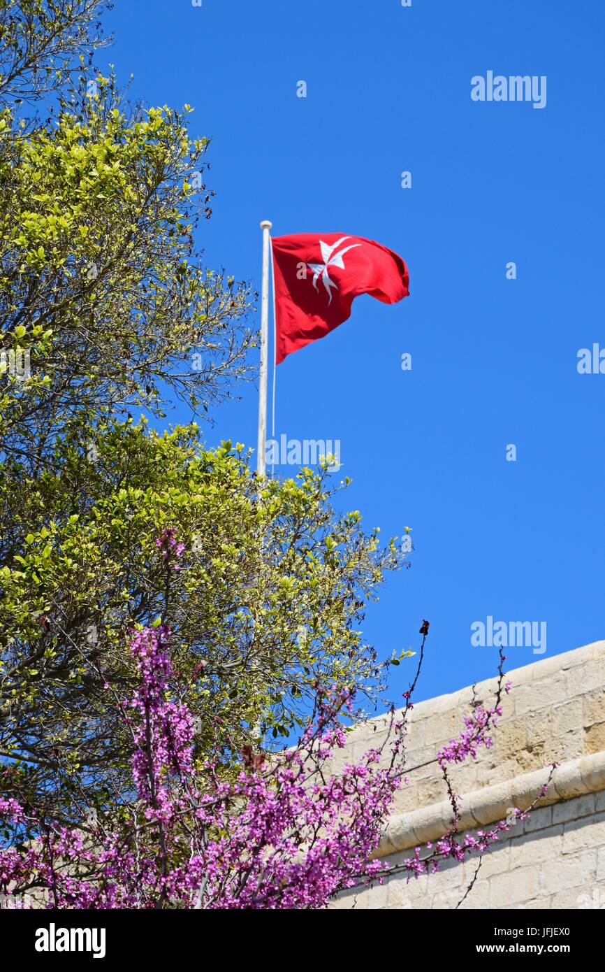 White maltese cross on red background flag hi-res stock photography and ...
