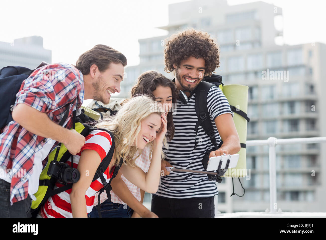 Group friends posing smartphone camera hi-res stock photography and ...
