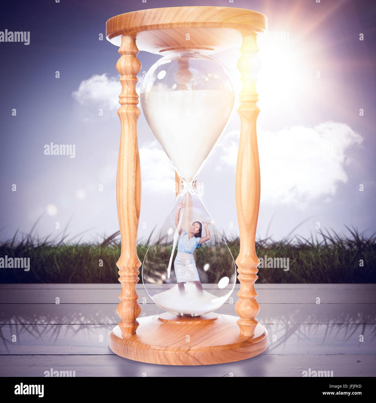 Composite image of scared young businesswoman holding something Stock ...