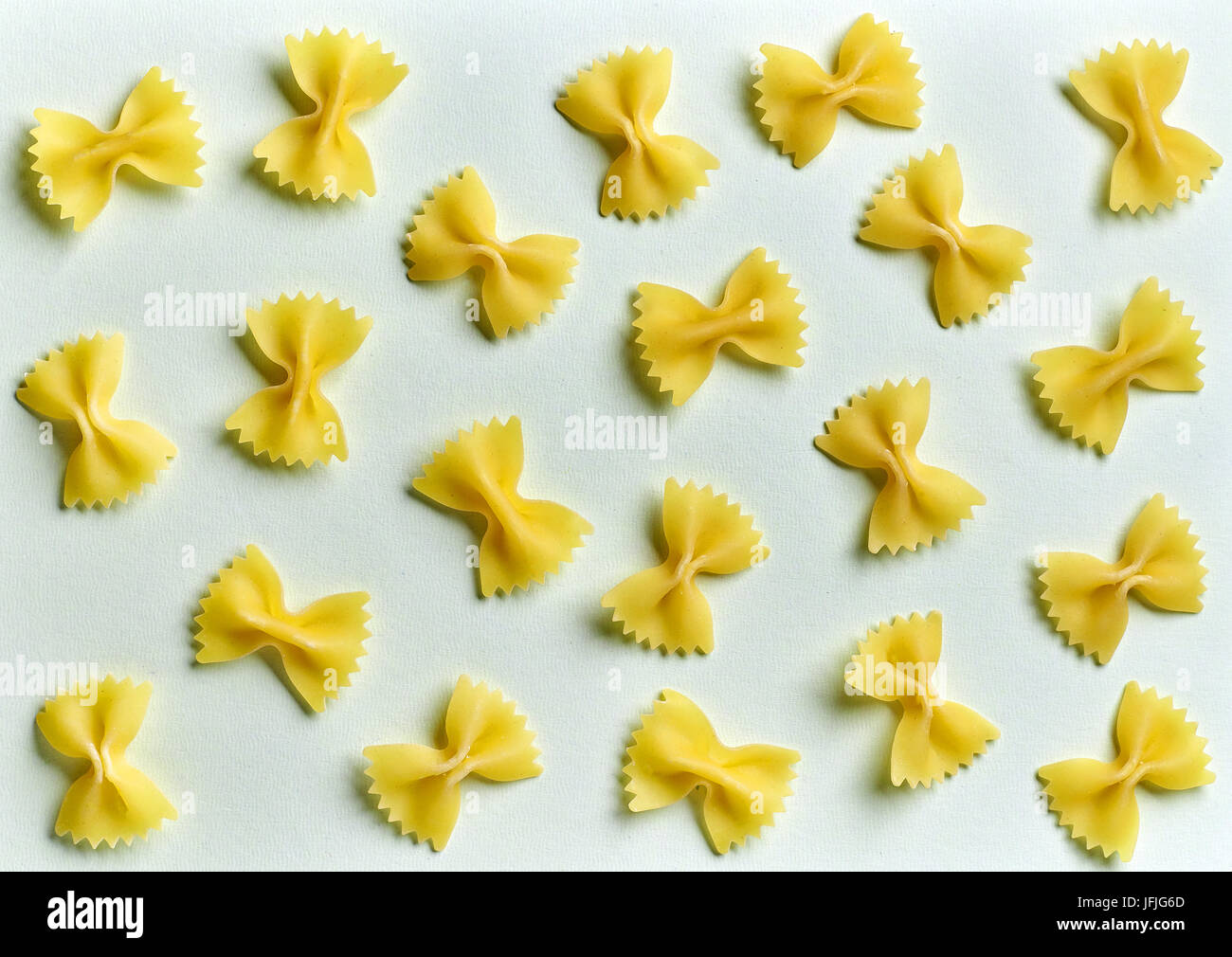 pattern of pasta bows, top view Stock Photo - Alamy