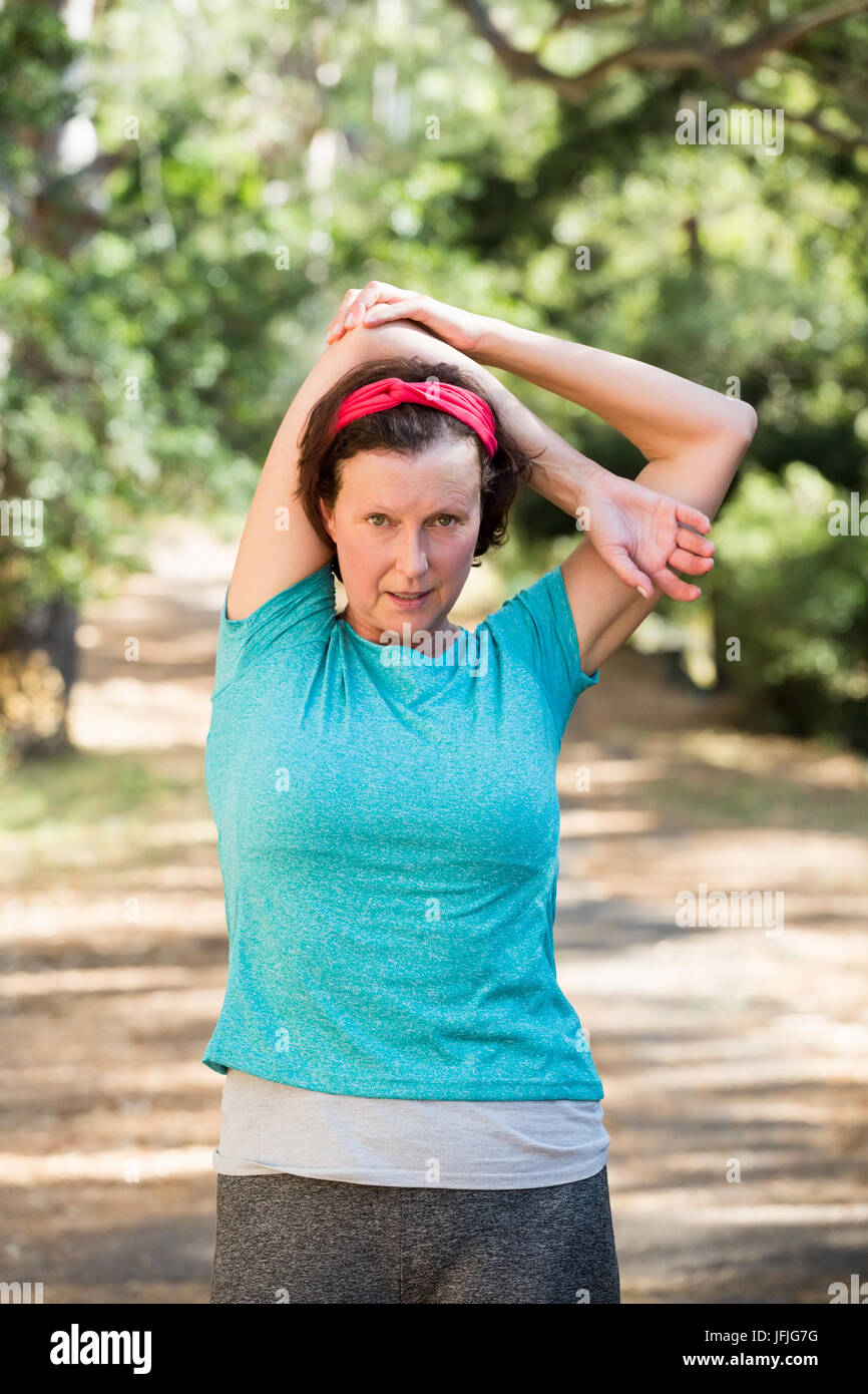Woman stretching her arms Stock Photo - Alamy