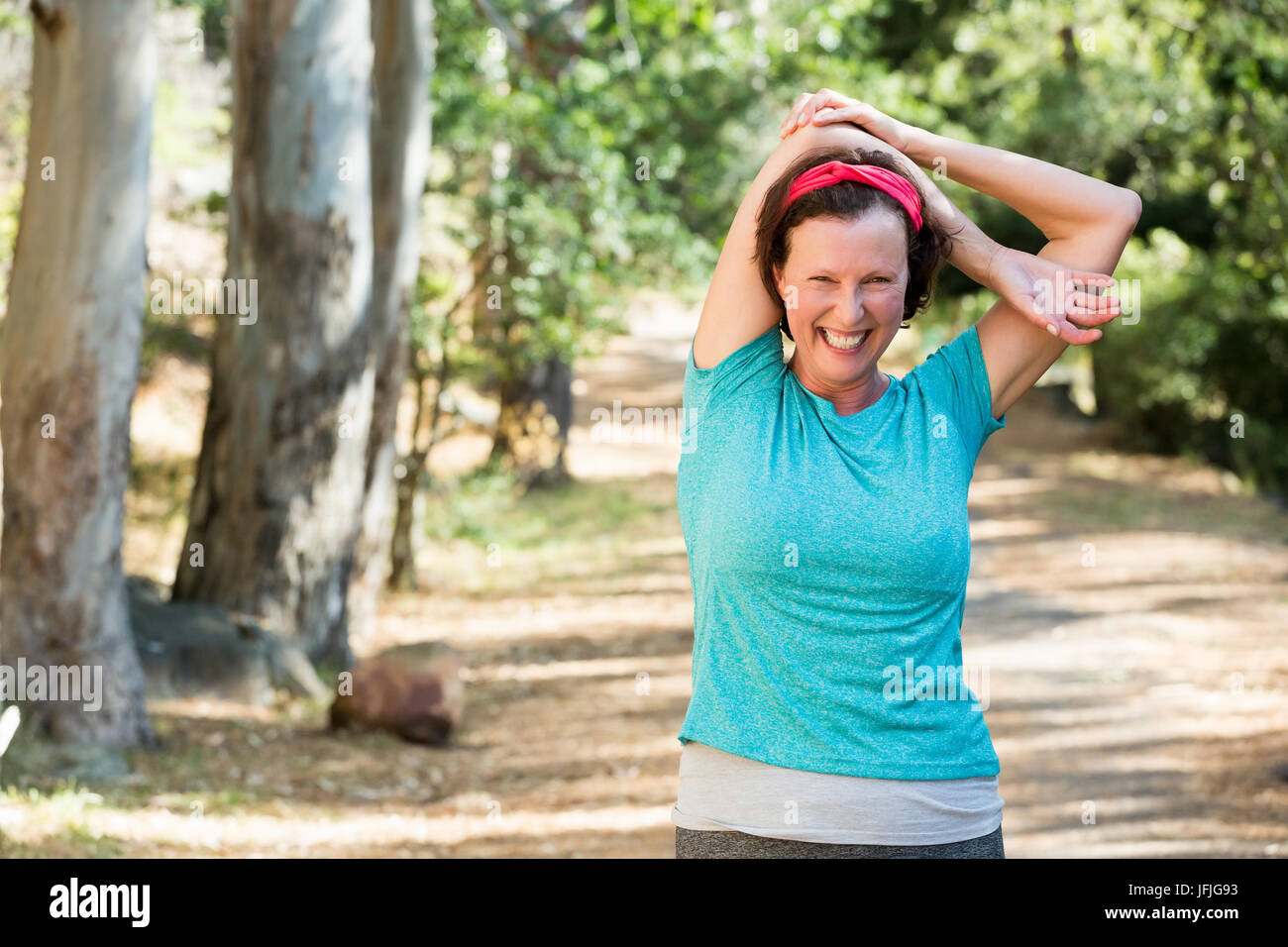 Woman stretching her arms Stock Photo - Alamy