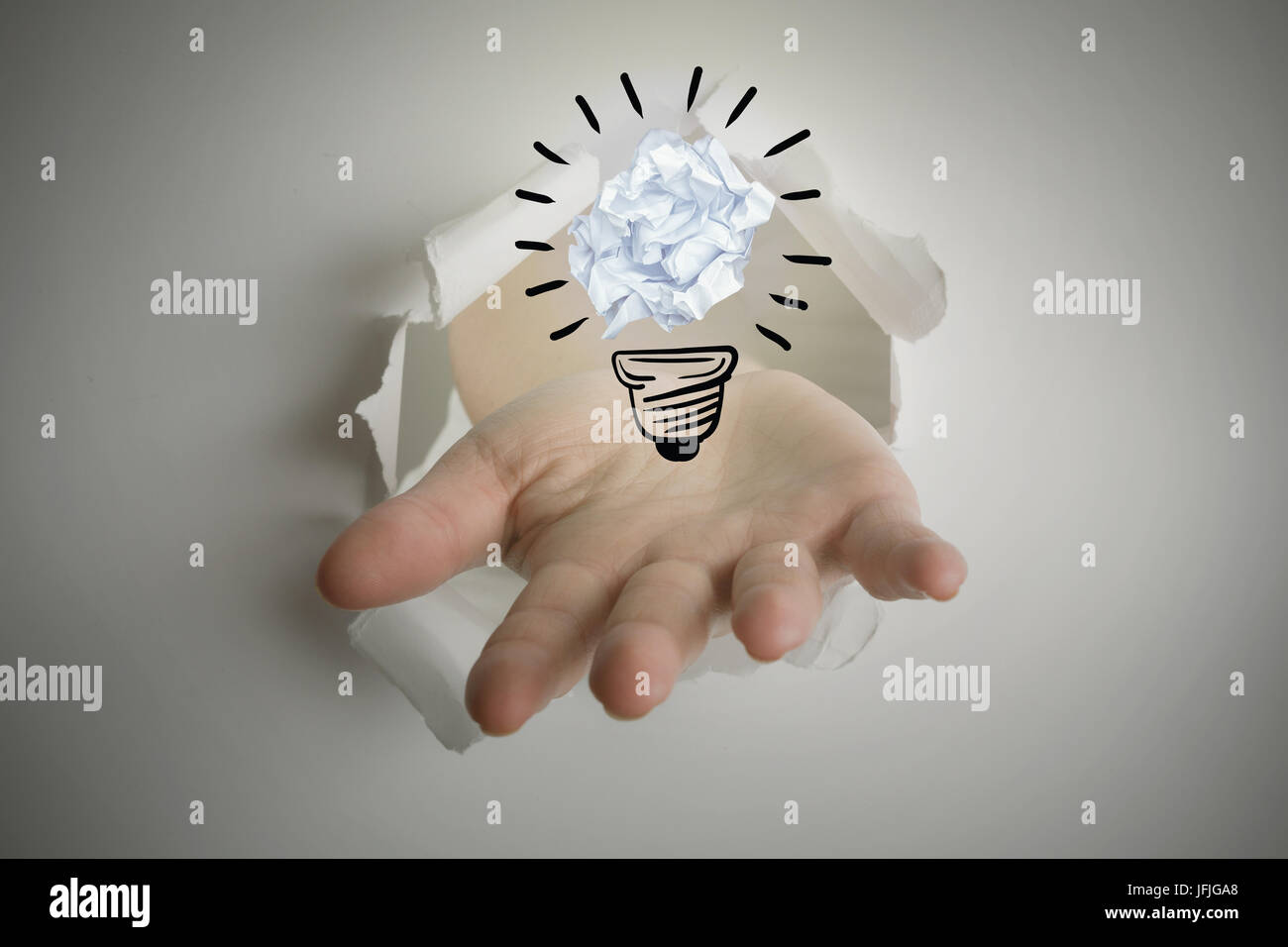 Bursting through paper hi-res stock photography and images - Alamy