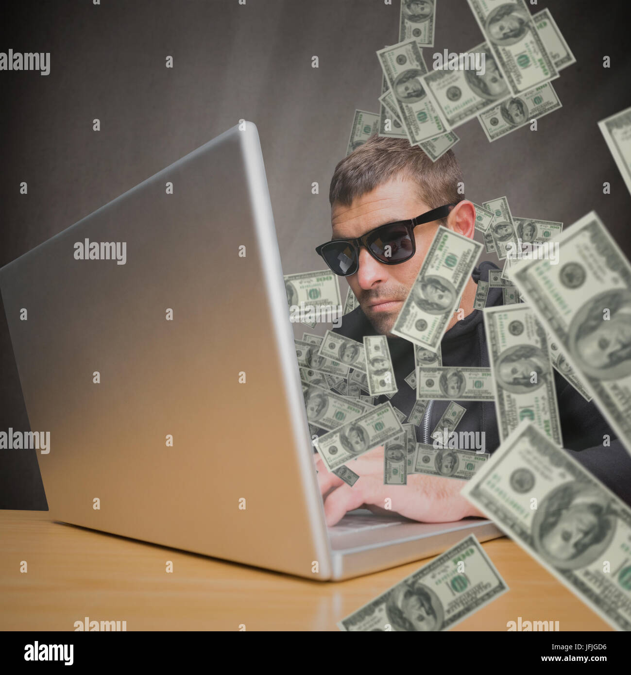 Composite image of hacker using laptop to steal identity Stock Photo ...