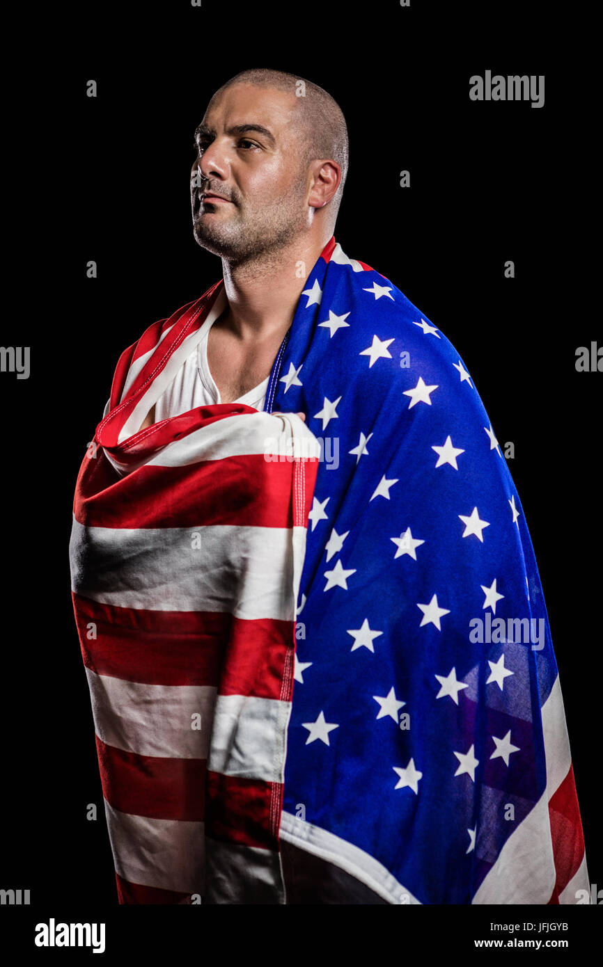 Athlete with england flag wrapped around his body Stock Photo - Alamy