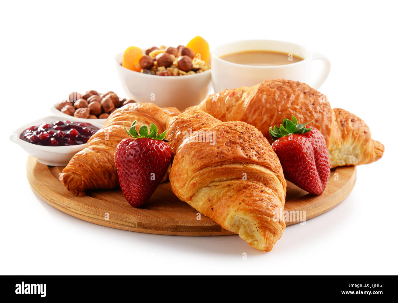 Composition with breakfast on the cutting board isolated on white Stock ...