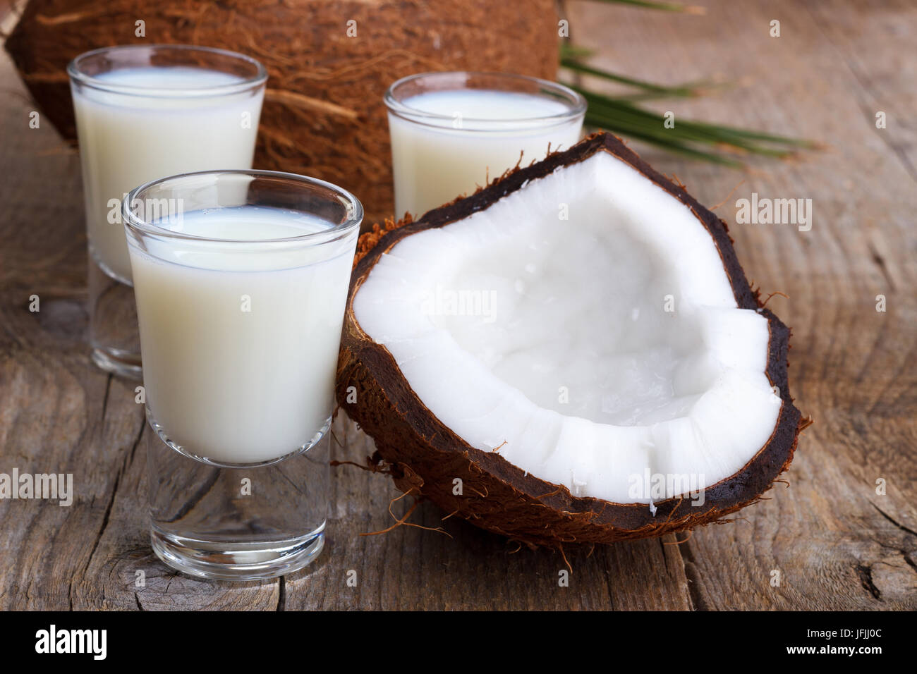 Coconut milk and shells Stock Photo - Alamy