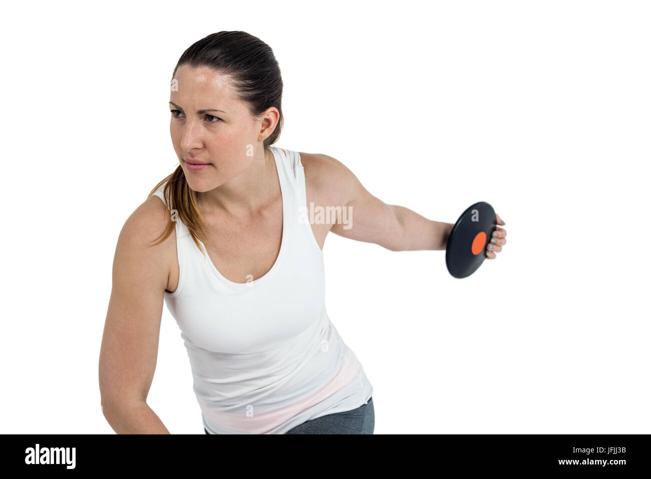 Female athlete playing discus throw on white background Stock Photo - Alamy