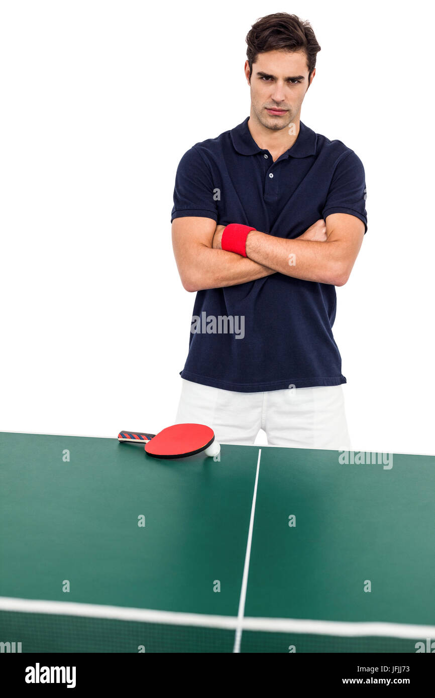Portrait of male athlete standing with arms crossed Stock Photo - Alamy