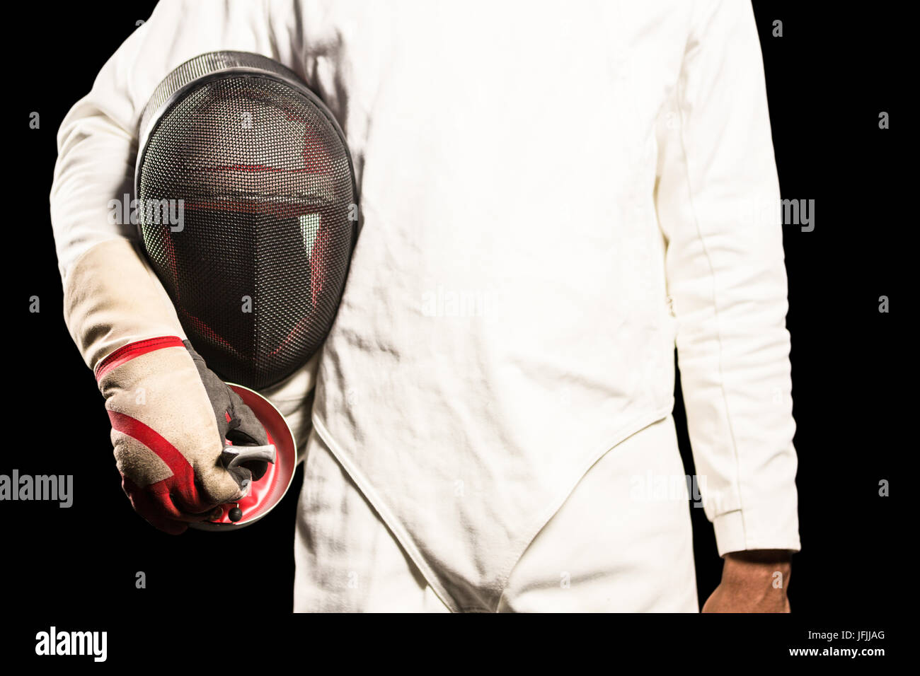 Mid-section of man standing with fencing mask Stock Photo - Alamy