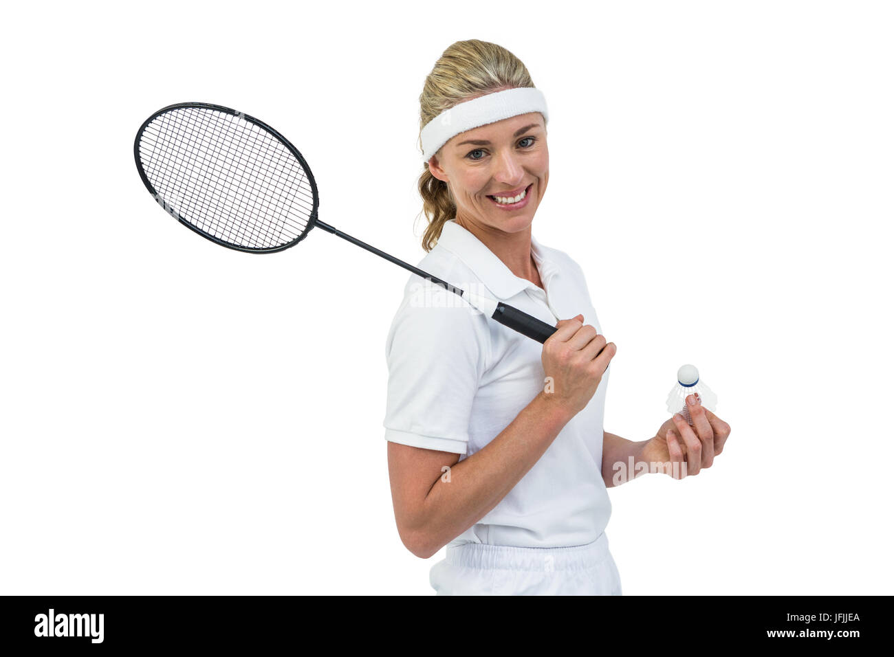 Badminton player holding badminton racket and shuttlecock Stock Photo ...