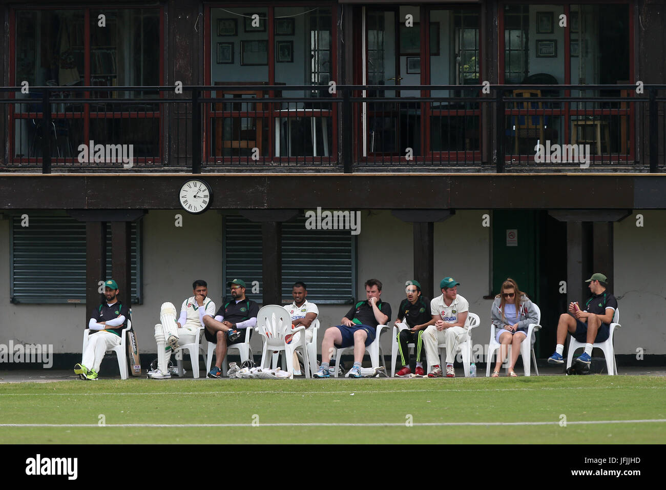 Harold Wood players look on from the pavilion during Gidea Park and ...