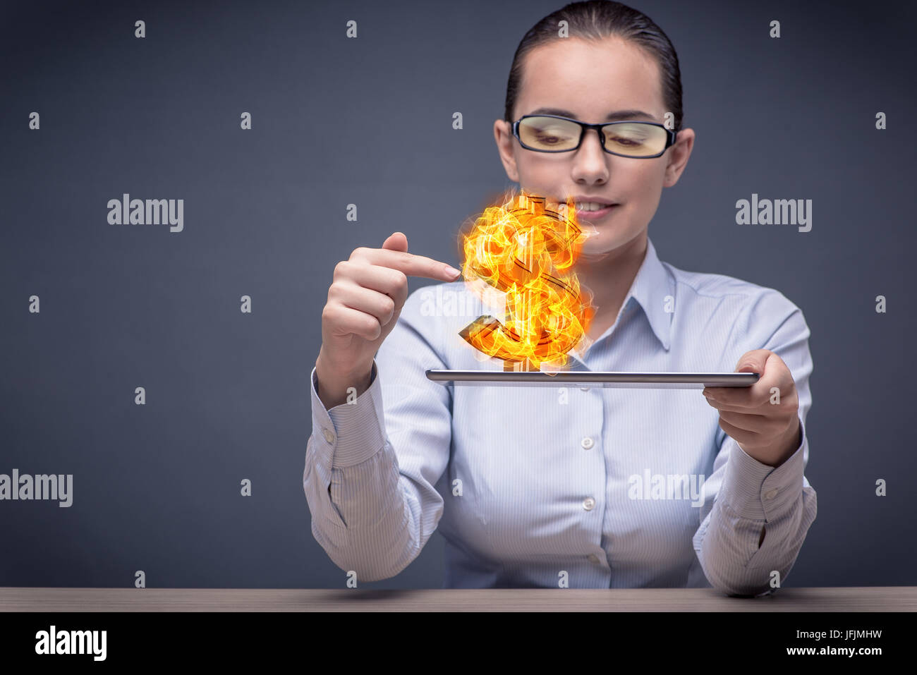 Woman burning money hi-res stock photography and images - Alamy