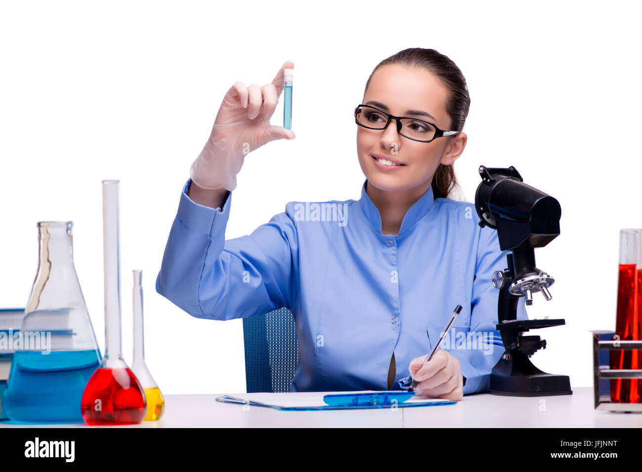 Lab chemist working with microscope and tubes Stock Photo - Alamy