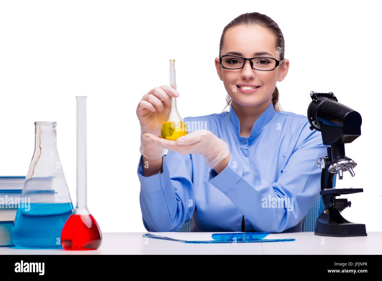 Lab chemist working with microscope and tubes Stock Photo - Alamy