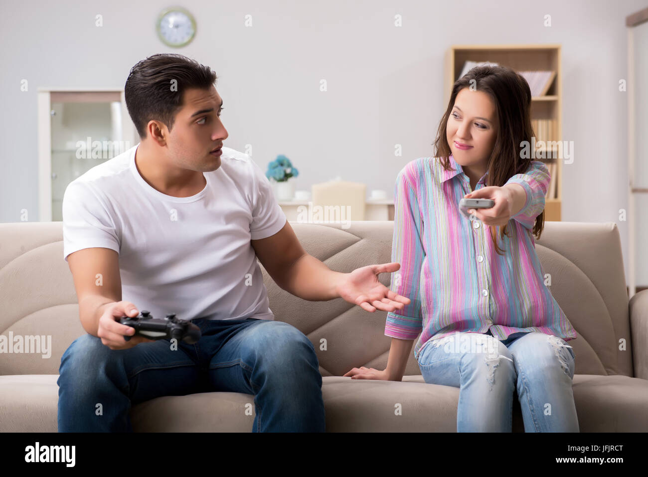Young family suffering from computer games addiction Stock Photo - Alamy