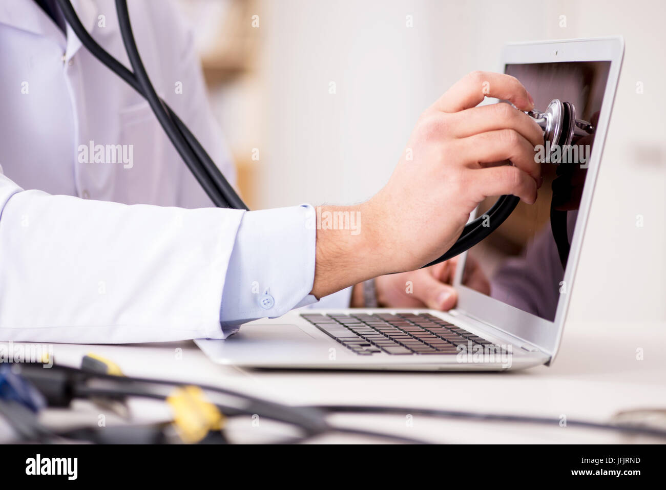 IT technician repairing broken laptop notebook computer Stock Photo - Alamy
