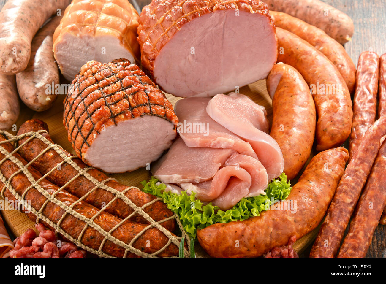 Assorted meat products including ham and sausages Stock Photo - Alamy