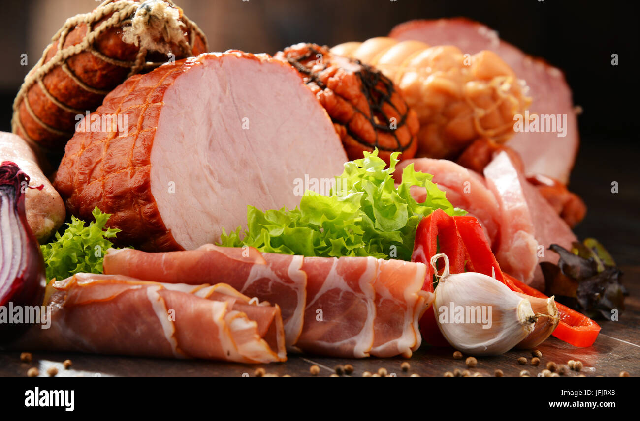 Assorted meat products including ham and sausages Stock Photo - Alamy