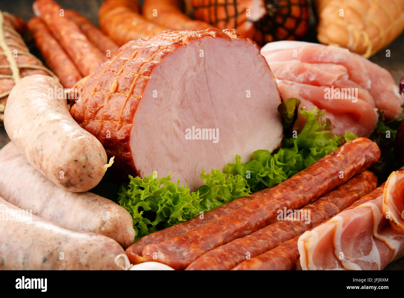Assorted meat products including ham and sausages Stock Photo - Alamy