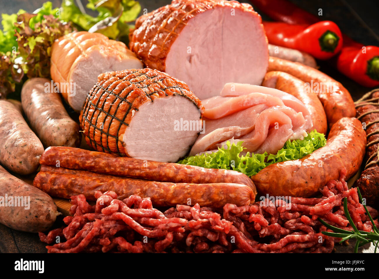 Assorted meat products including ham and sausages Stock Photo - Alamy