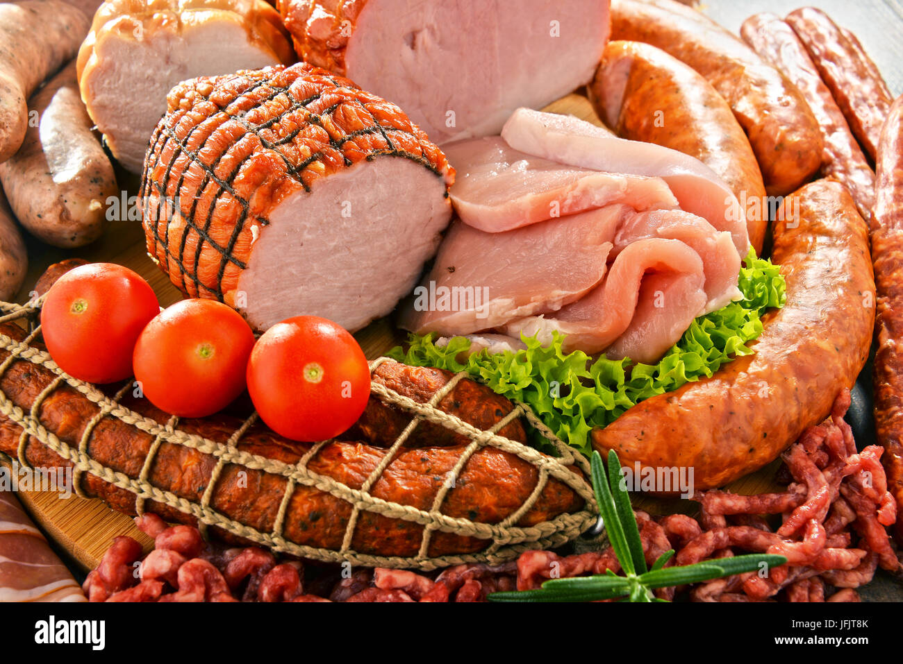 Assorted meat products including ham and sausages Stock Photo - Alamy