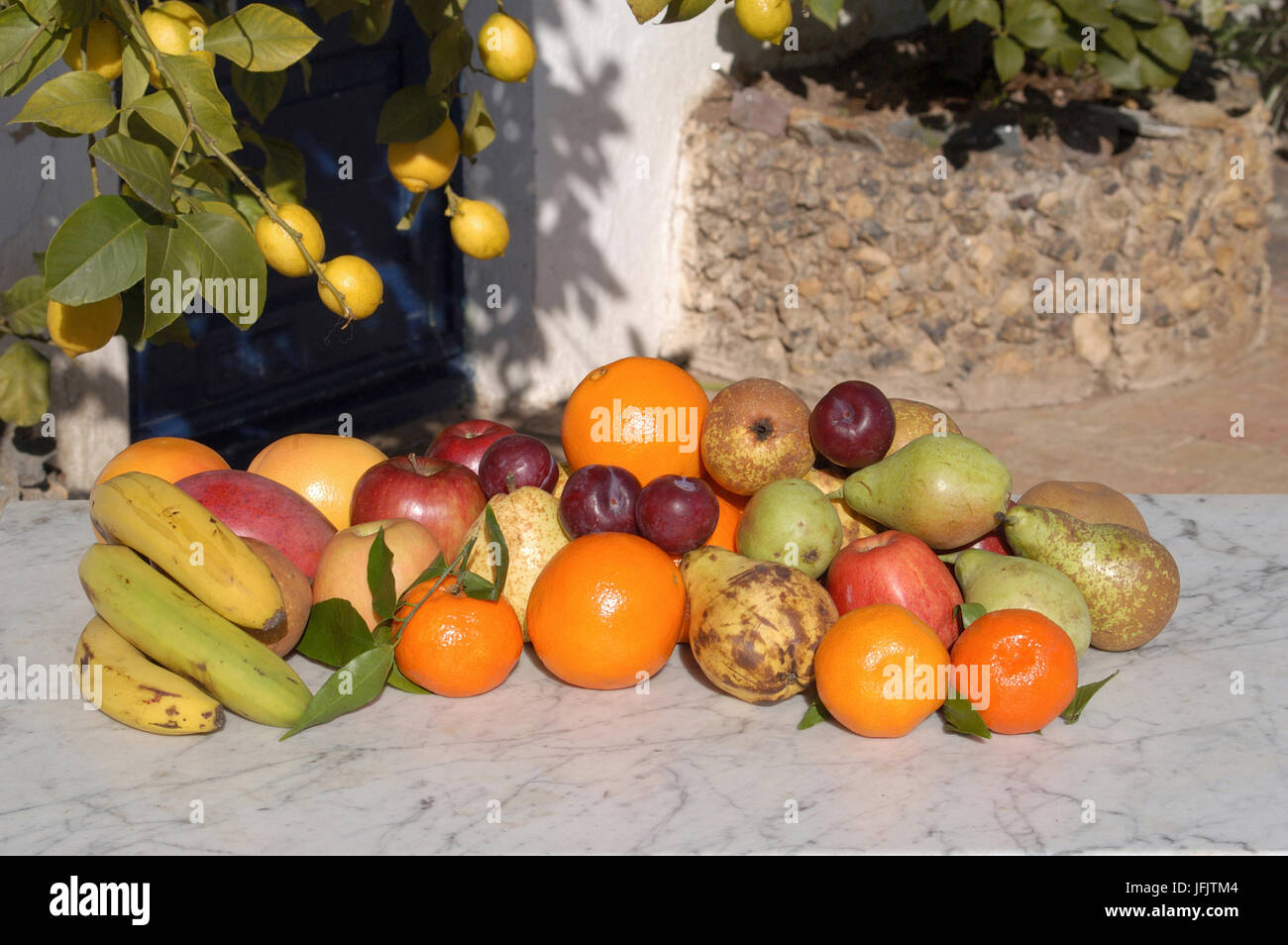 Still life of fruit with sunlight outside, fruits Stock Photo - Alamy