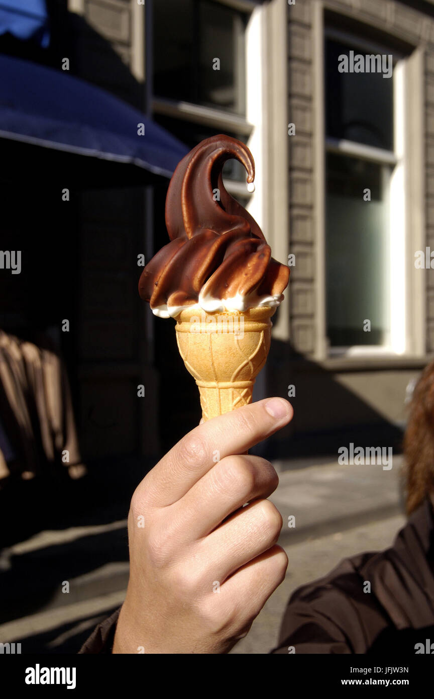hand grabbing an ice cream, day Stock Photo - Alamy