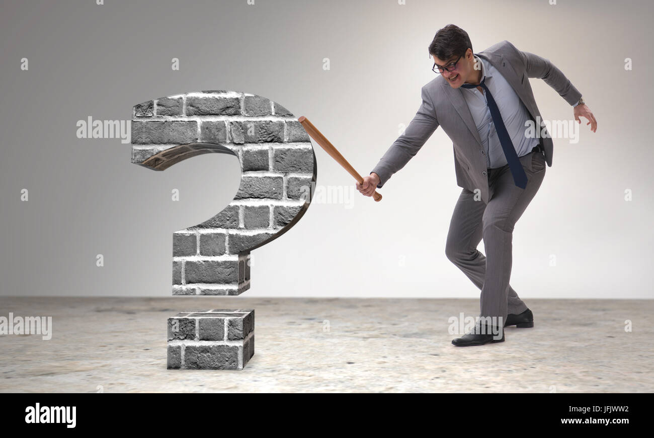 Angry man with baseball bat hitting question mark Stock Photo - Alamy