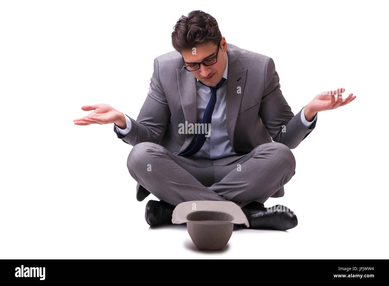 Bankrupt businessman isolated on white background Stock Photo - Alamy