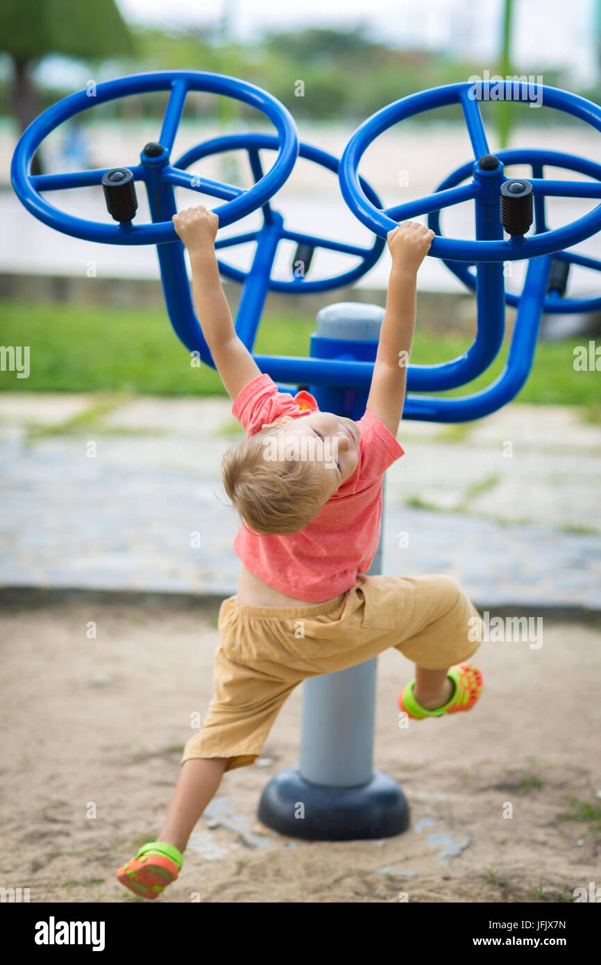Boy doing exercises Stock Photo - Alamy